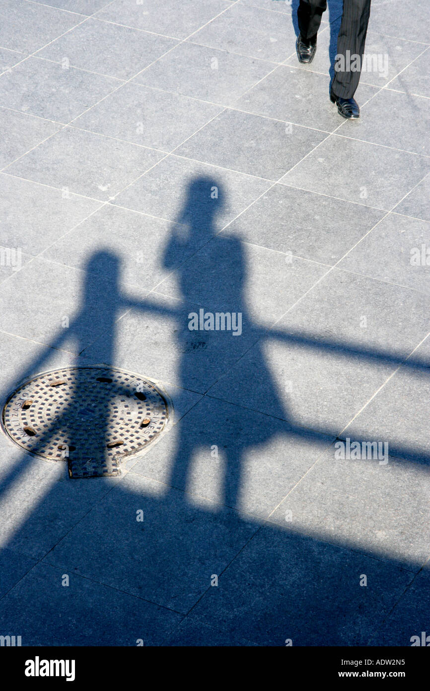 SHADOW OF WOMAN WITH MAN APPROACHING Stock Photo - Alamy