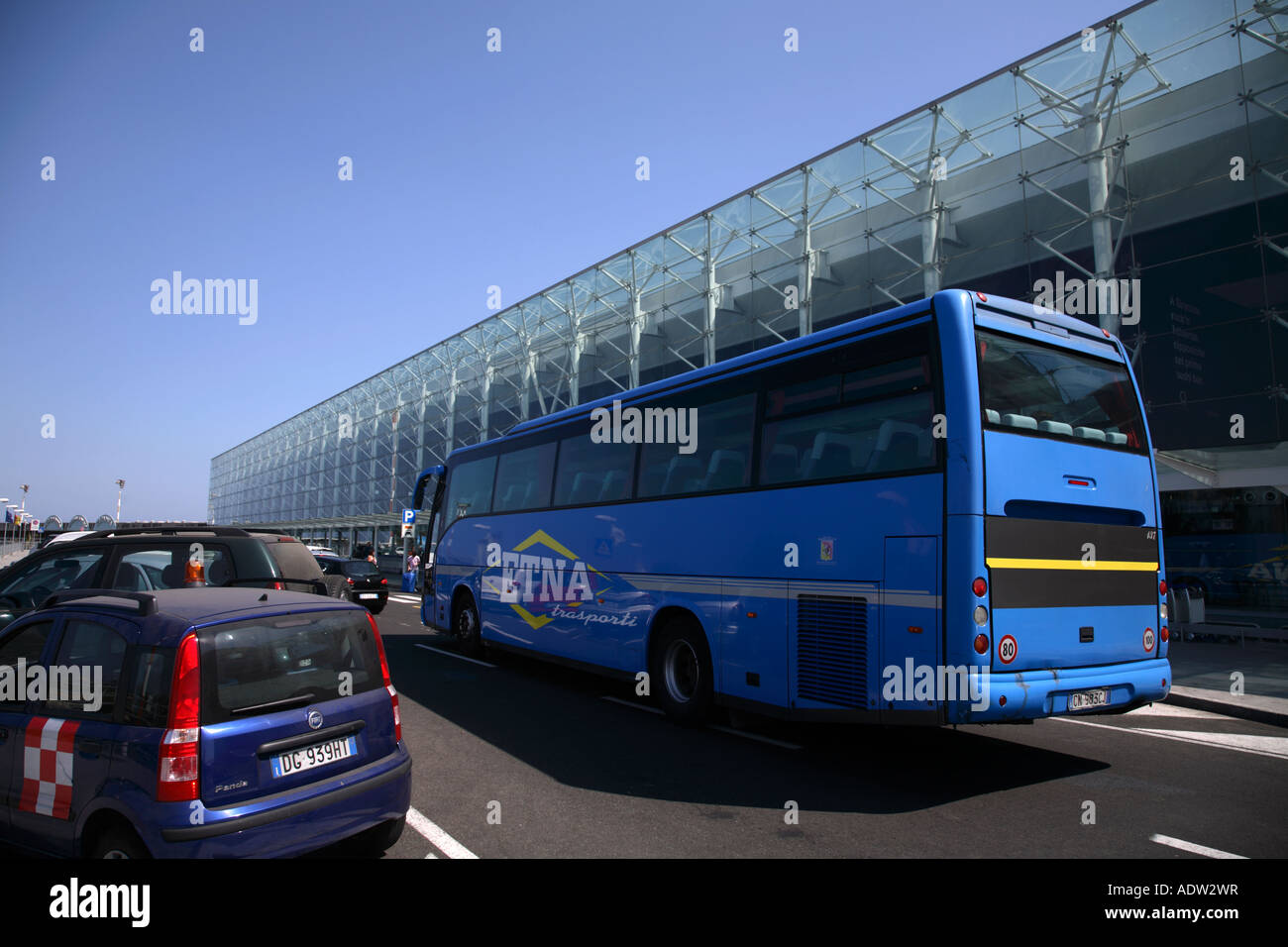 Cars and Etna Bus at Departure Terminal Catania Airport Sicily Italy ...