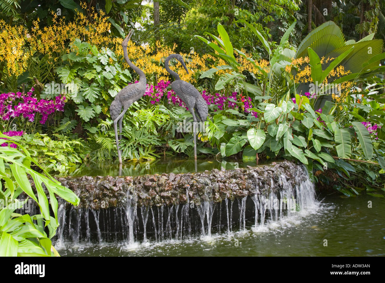 Crane sculptures and decorative water feature fountain surrounded by ...