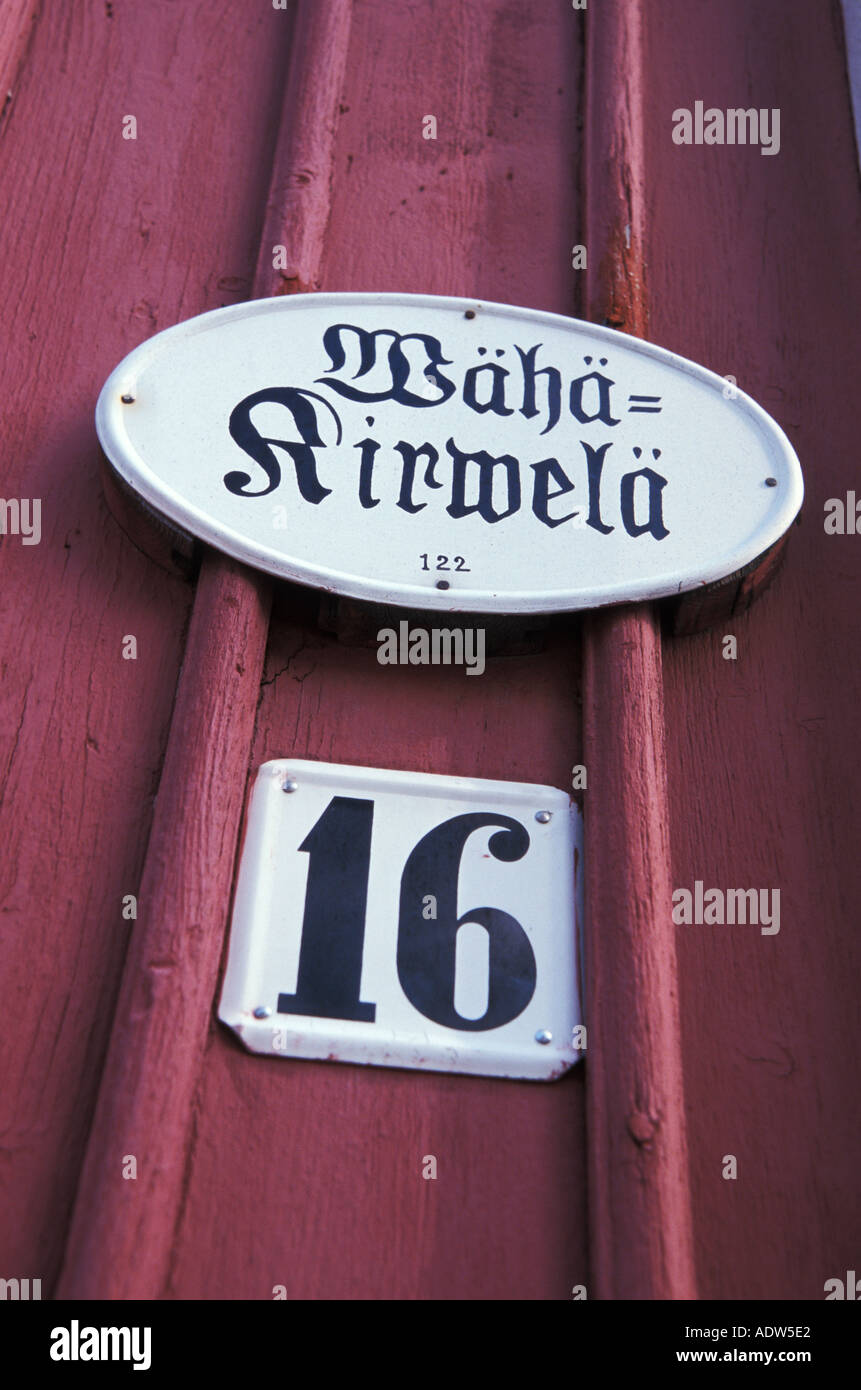 wooden house, street sign Stock Photo - Alamy