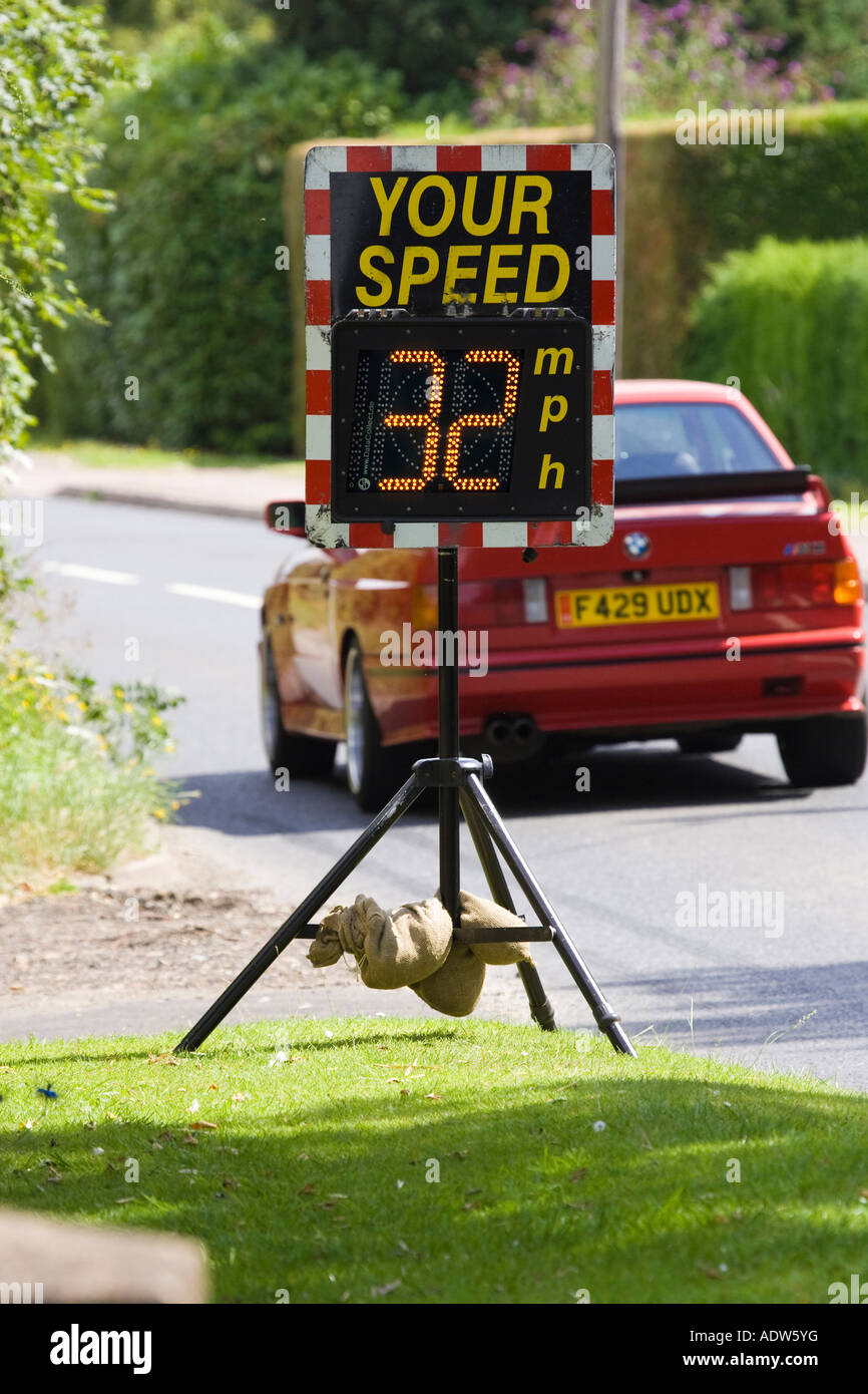 a radar based speed display sign next to a road Stock Photo - Alamy