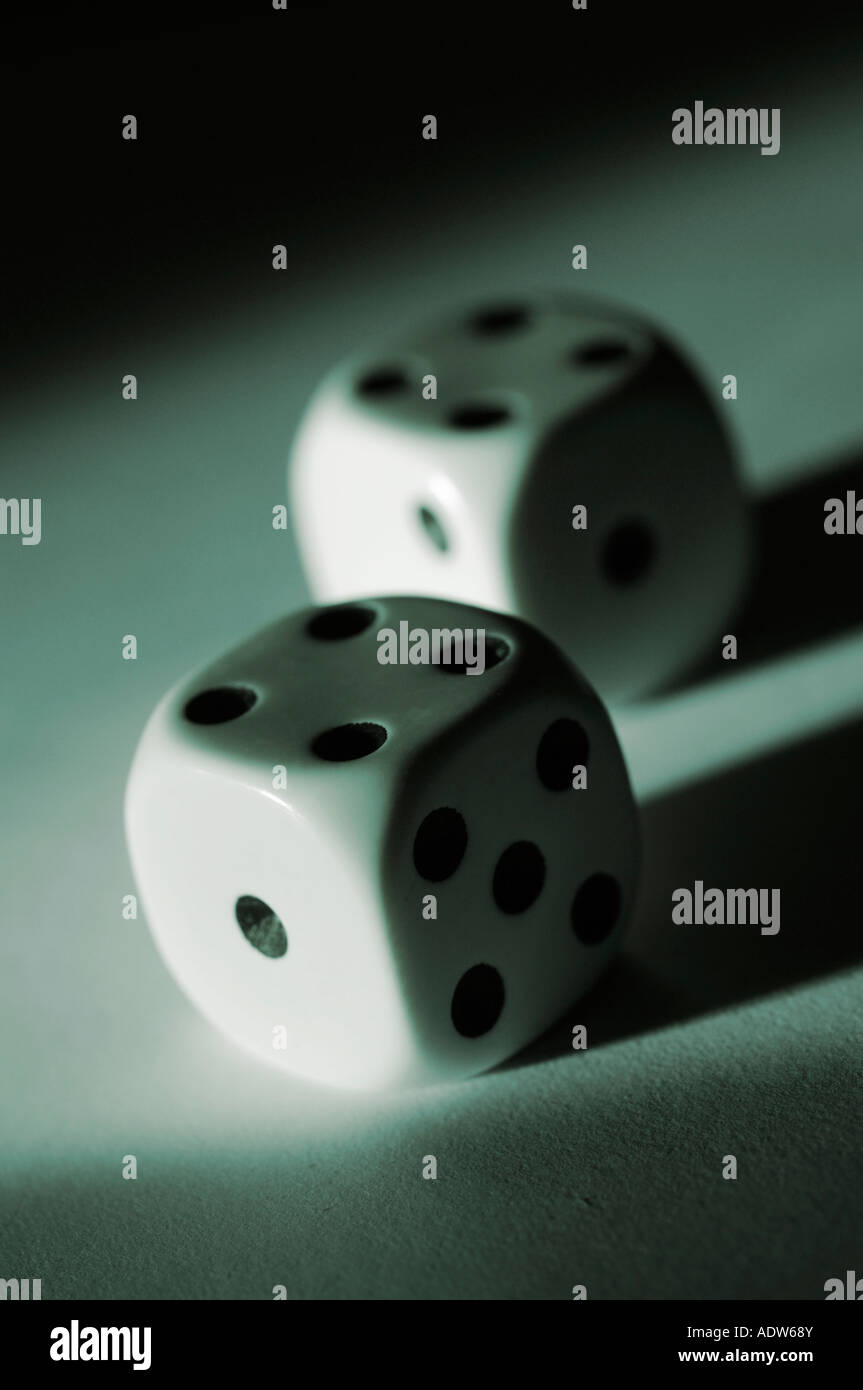 Pair of dice showing 2 fours Stock Photo - Alamy