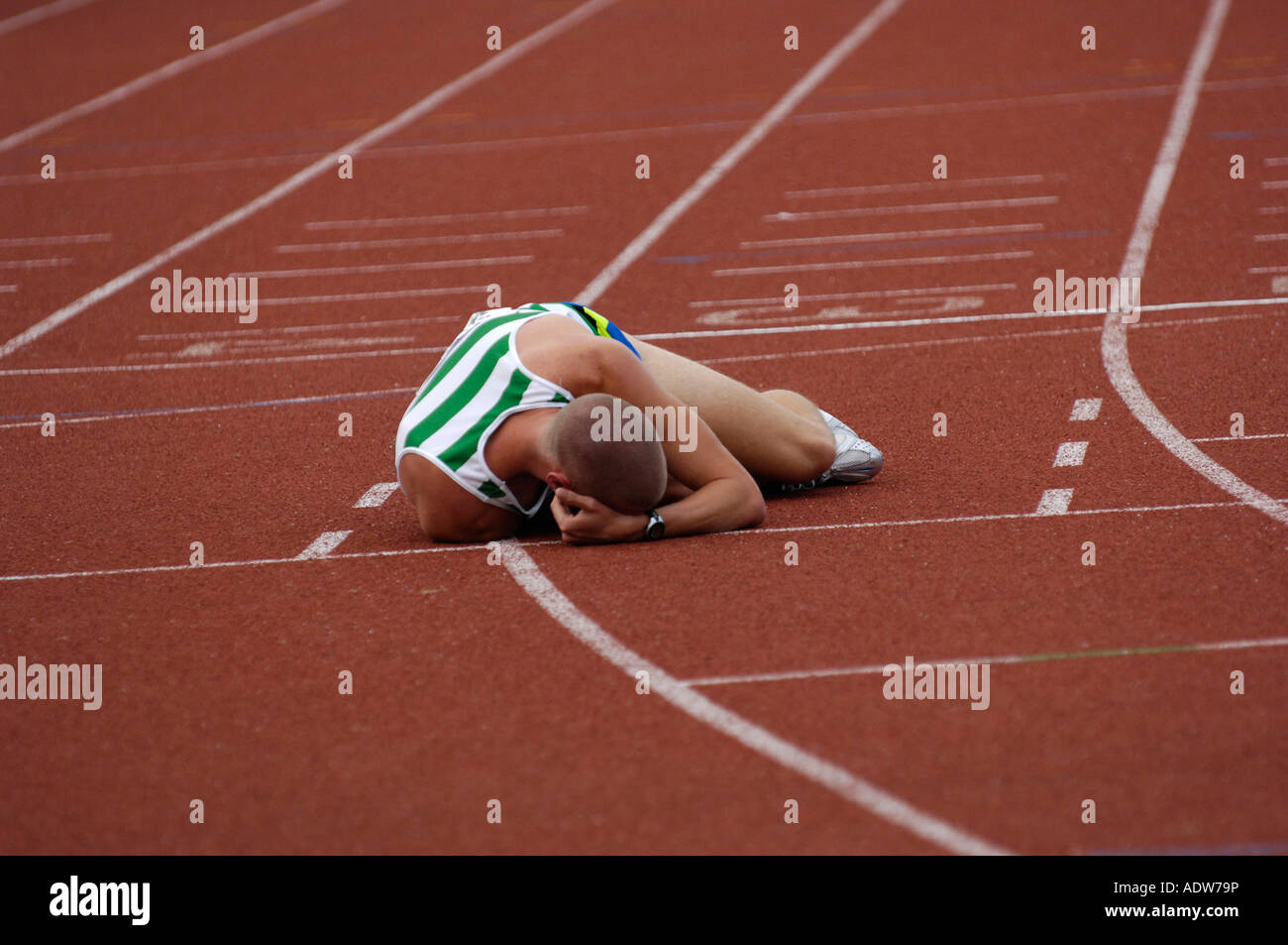 Athlete exhausted after race Stock Photo - Alamy