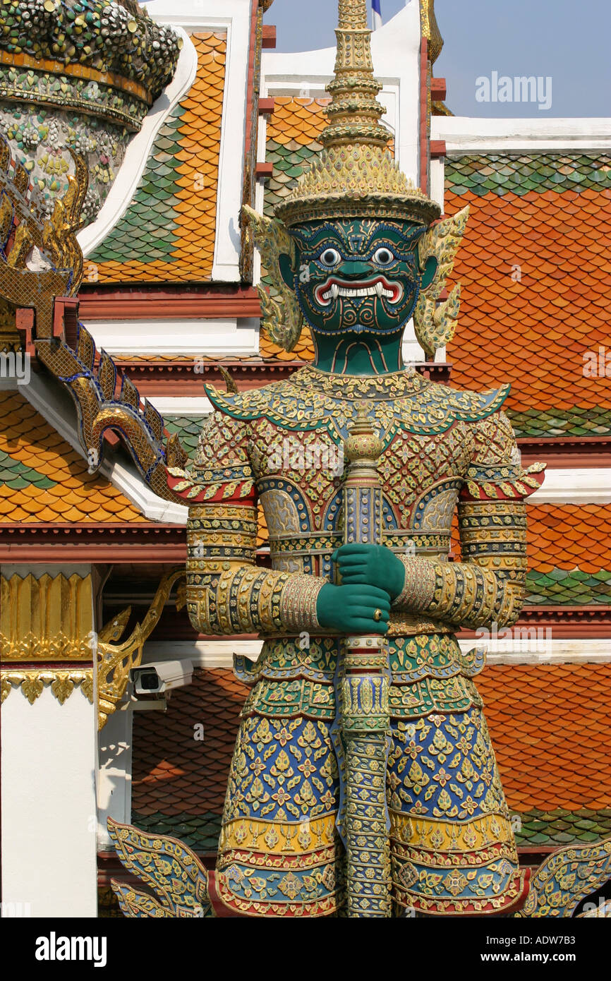 Large green guardian statue stands at an entrance to the Grand Palace ...