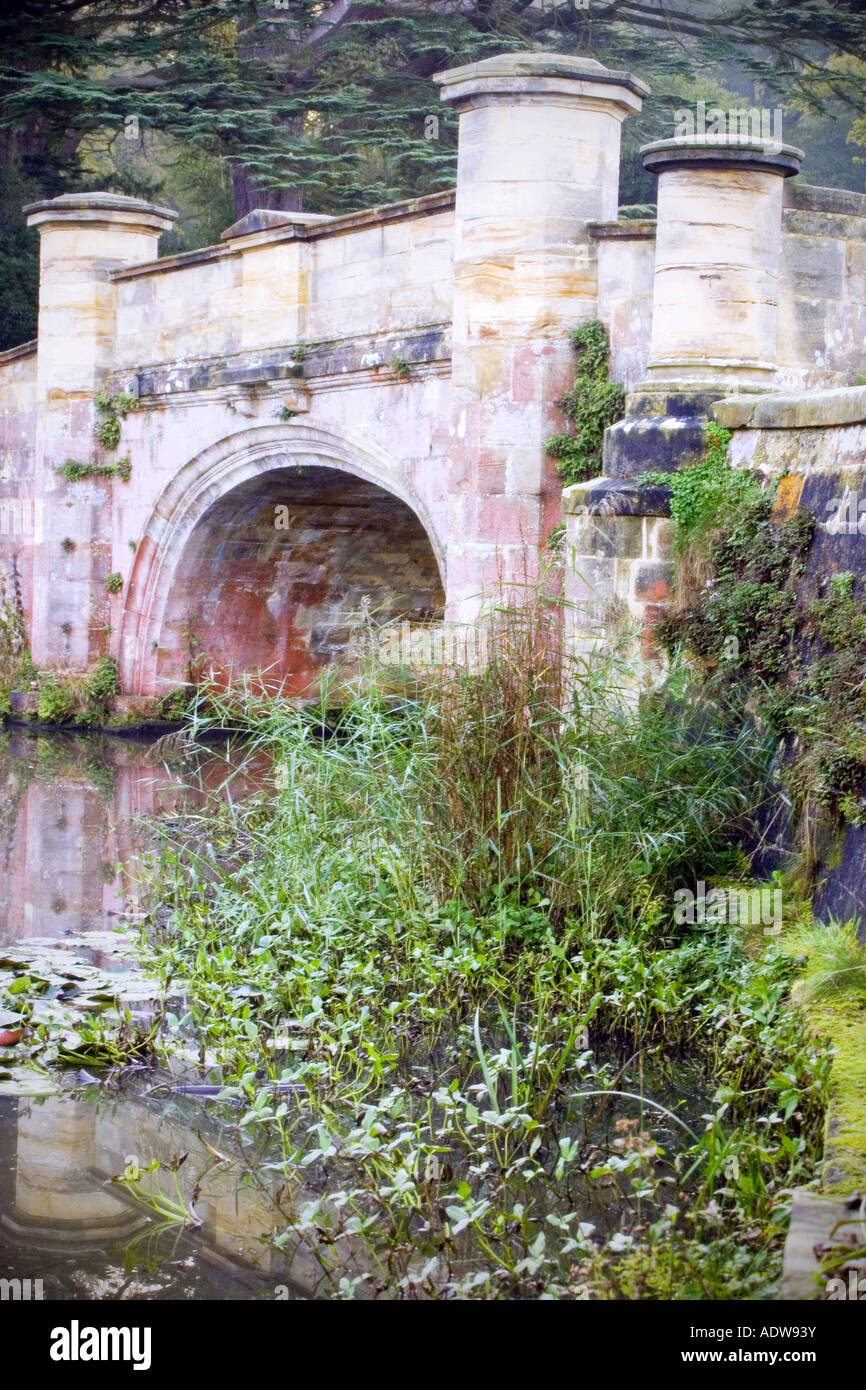 Bridge over the lake at English country house and mansion Ashburnham ...