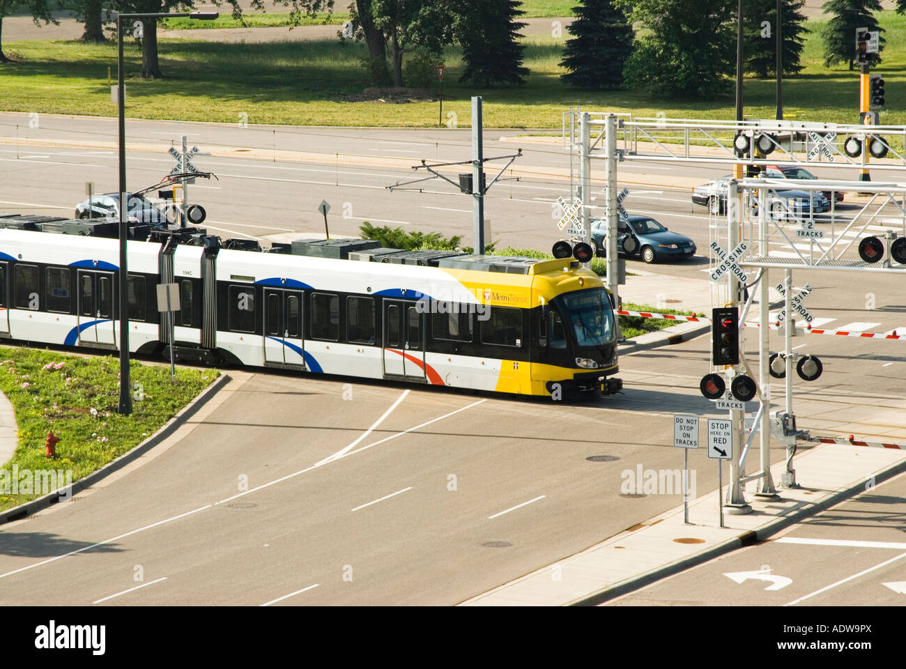 a light rail mass transit train crossing an intersection in Bloomington ...