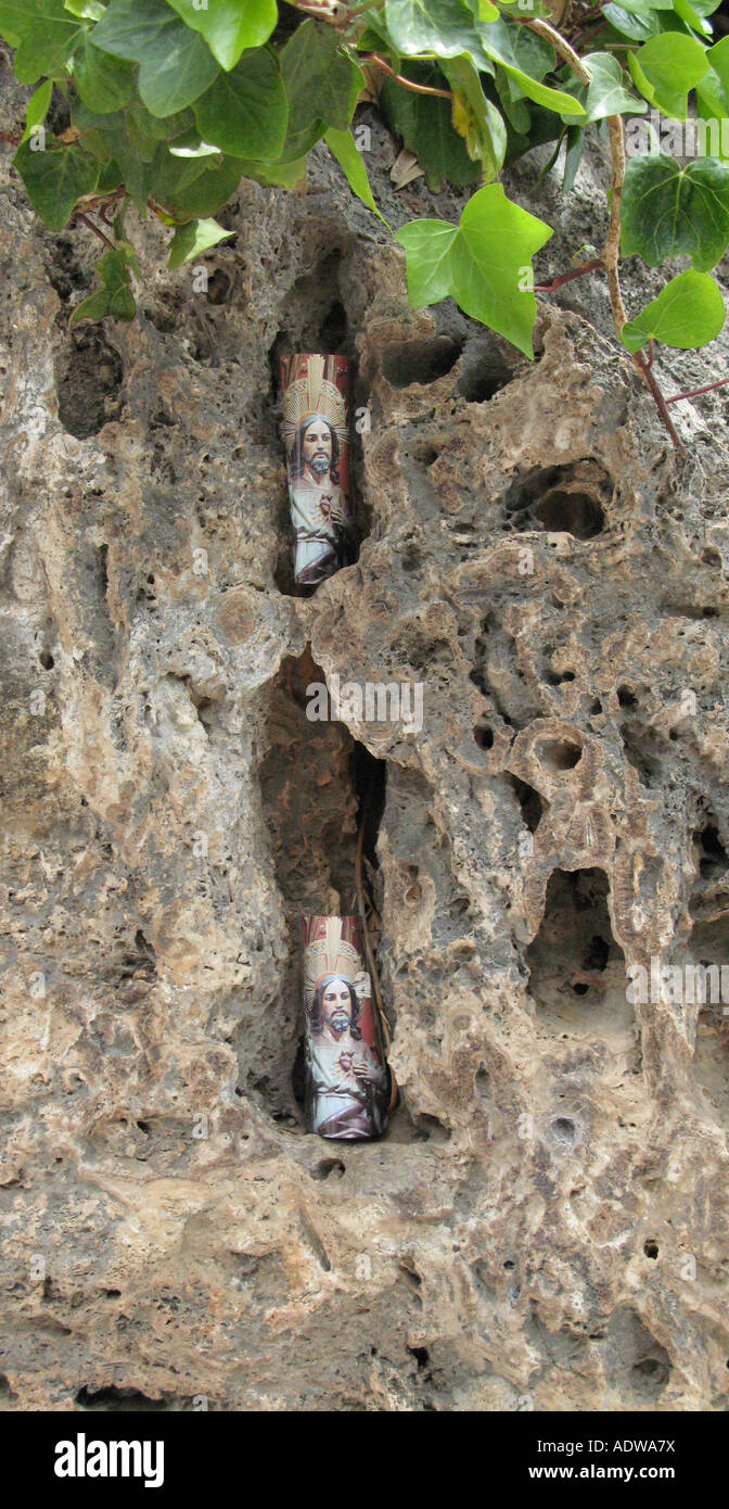 Ritual items placed in the wall outside the Shrine of the Calvario ...