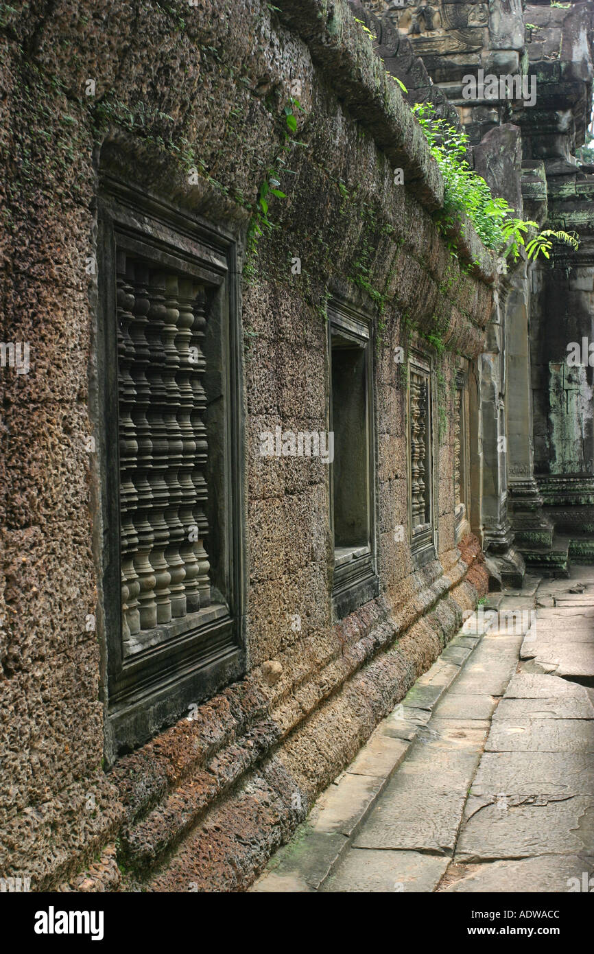 Ornate carved stone window frames stand at the ancient Pre Rup temple ...