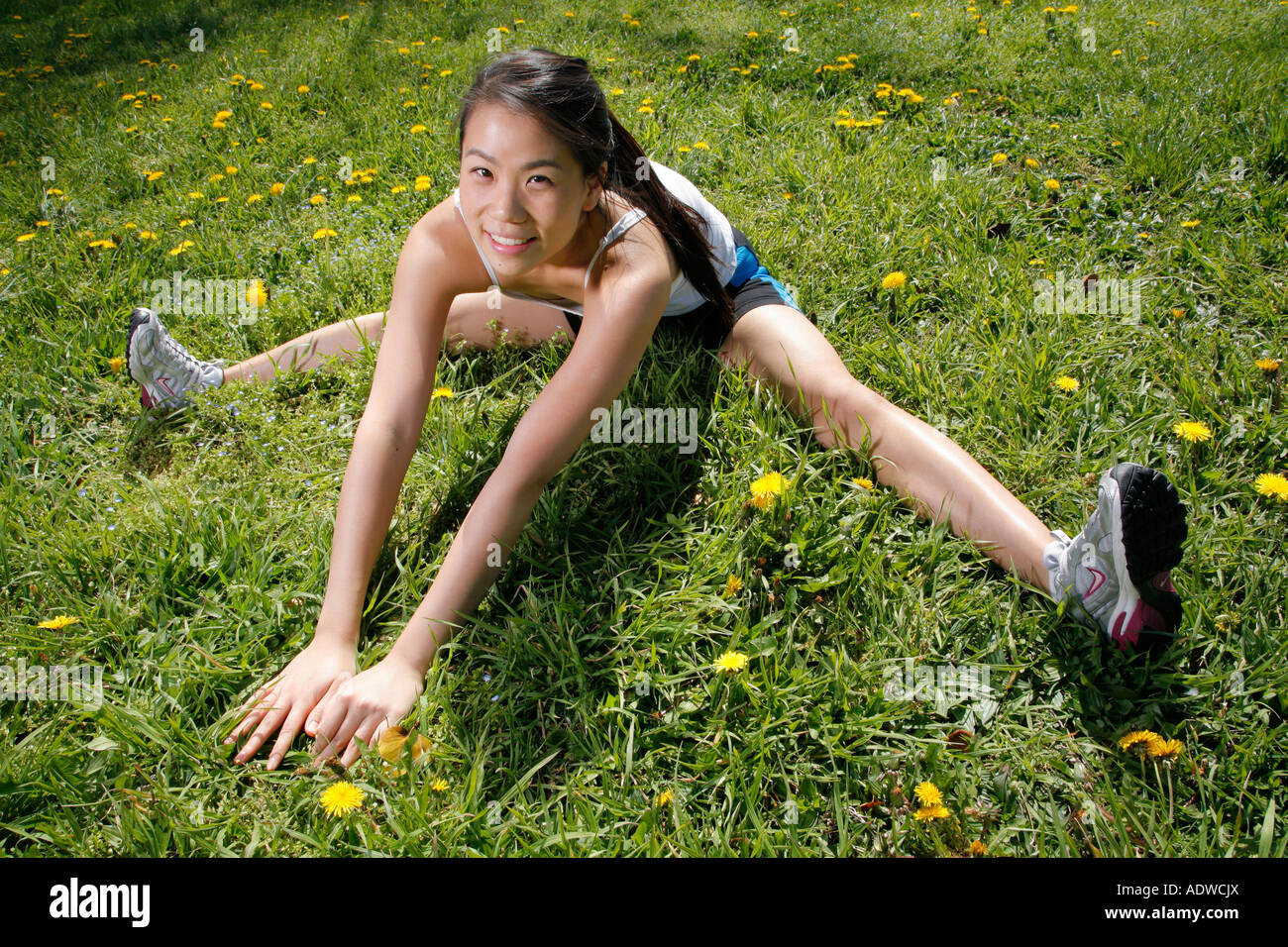 Young woman, 23, Asian American, Chinese, stretching, Washington, DC ...