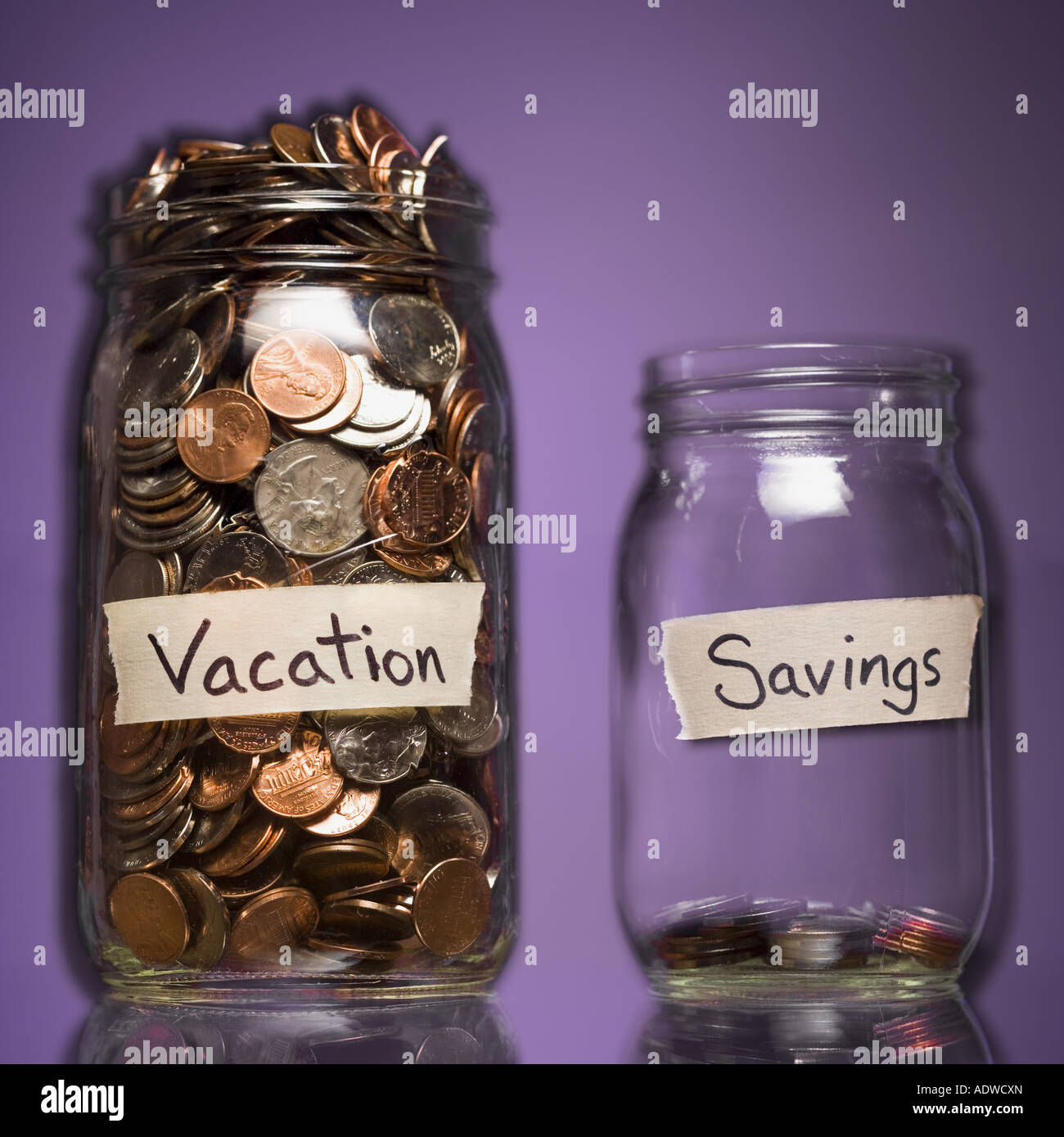 Two glass jars with change labeled Education and Savings Stock Photo ...