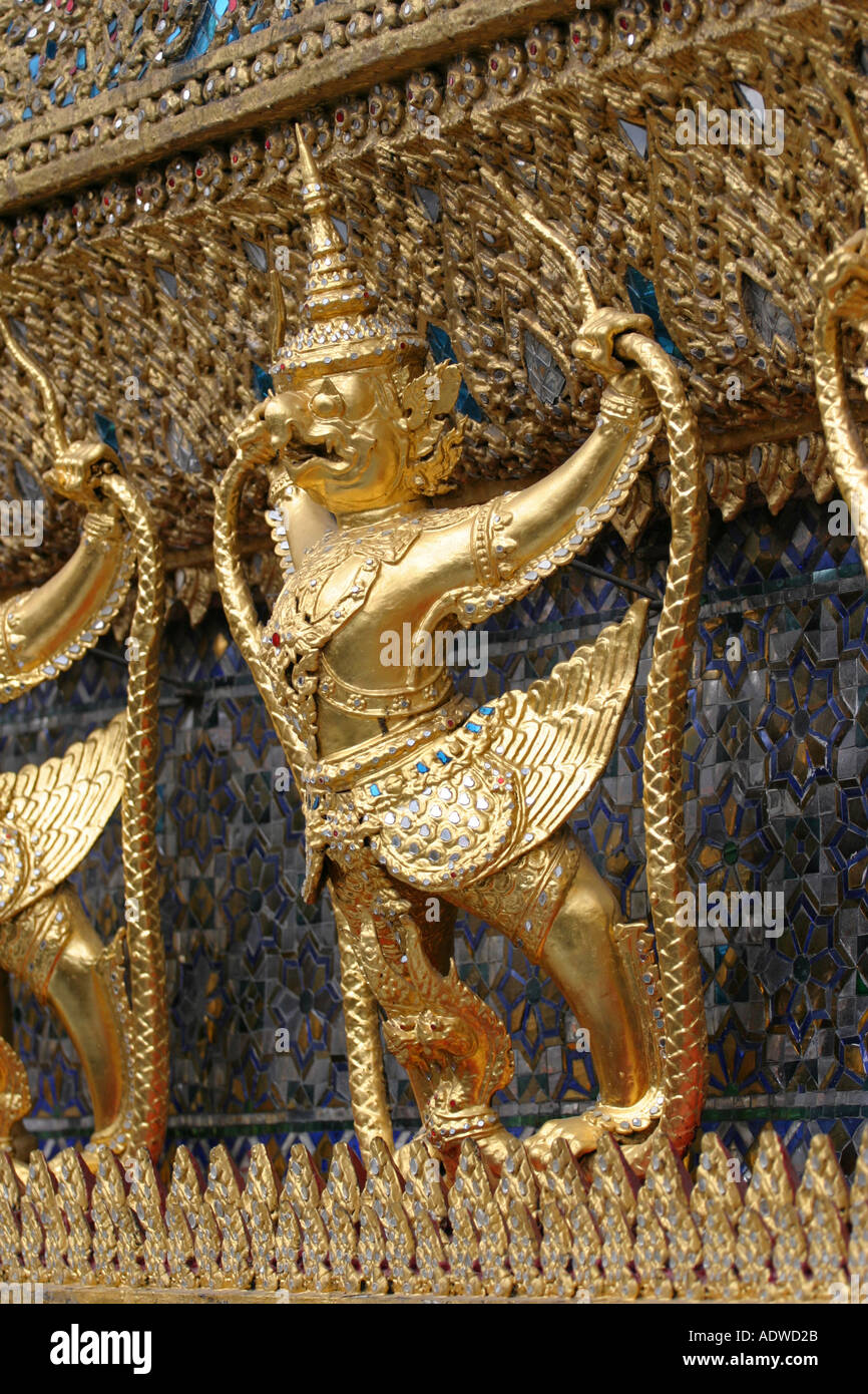 Spectacular golden angels on the side of the Grand Palace in Bangkok ...