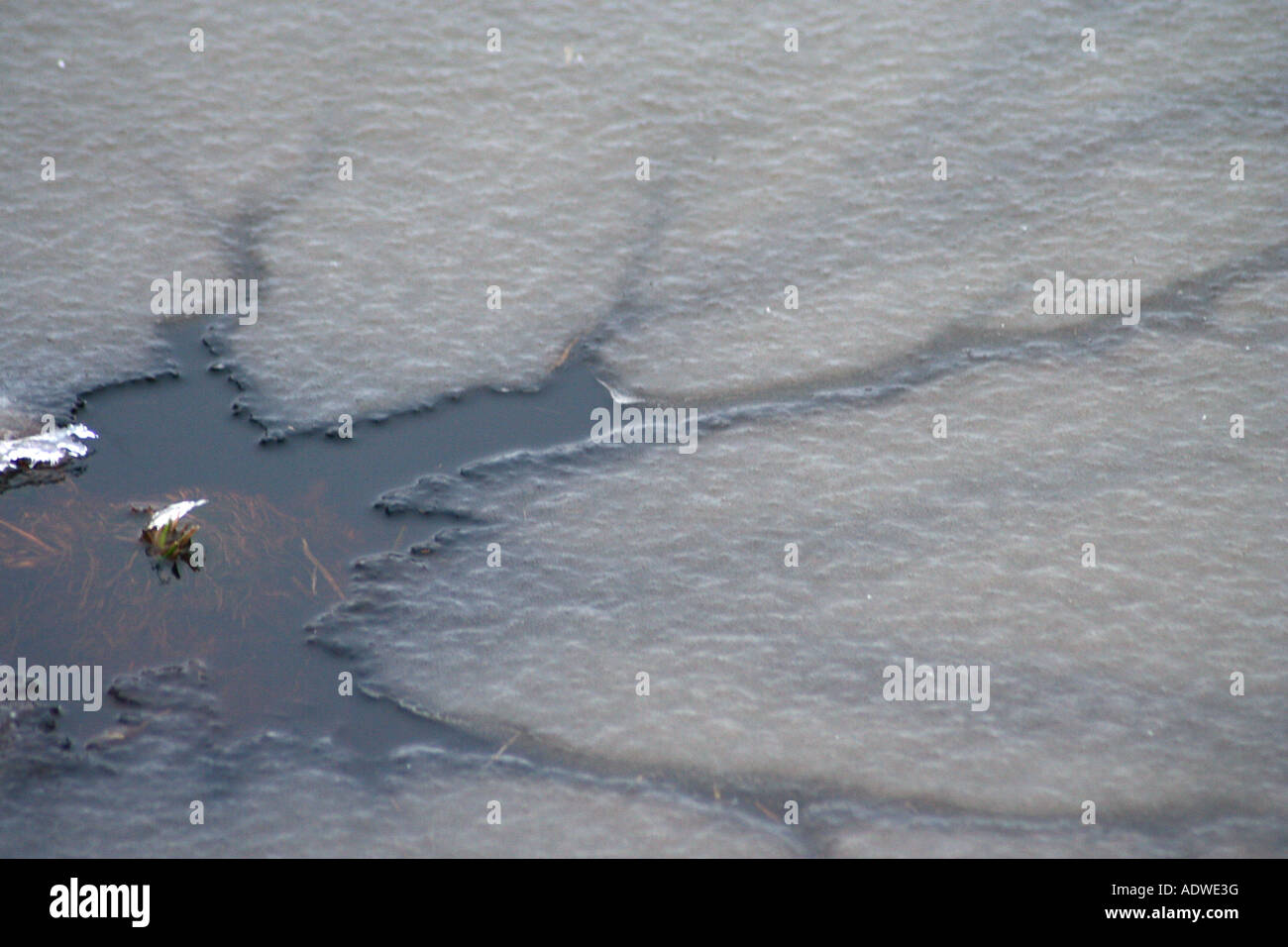 Broken ice hole hi-res stock photography and images - Alamy