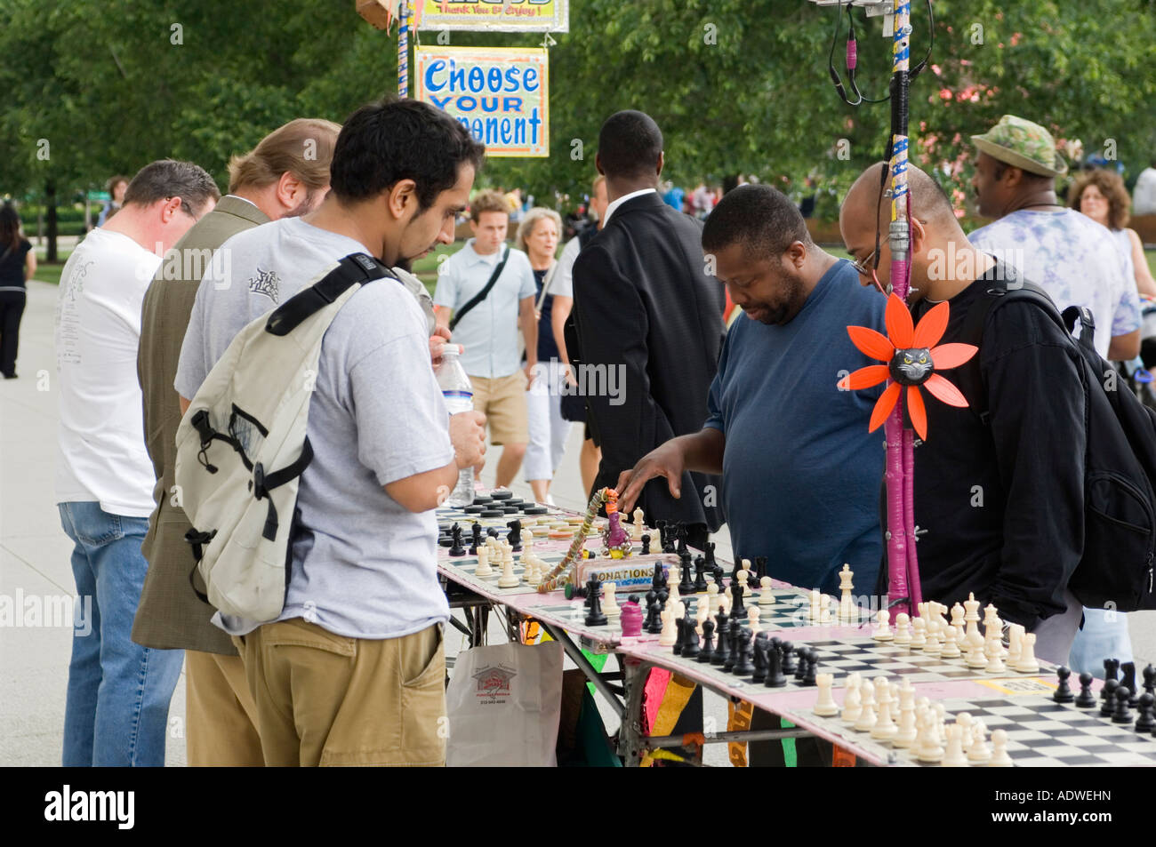 Outdoor chess game in Chicago Millennium Park with black male playing ...