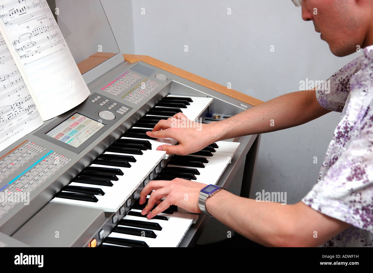 Japanese man playing the piano Ikebukuro Japan Tokyo pianist musician ...