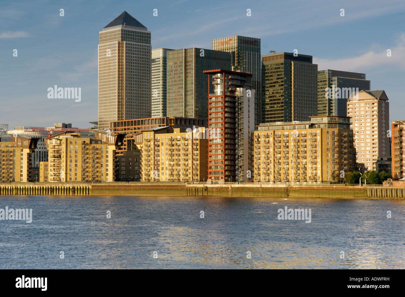 Evening view across the Thames river of the Canary Wharf commercial ...