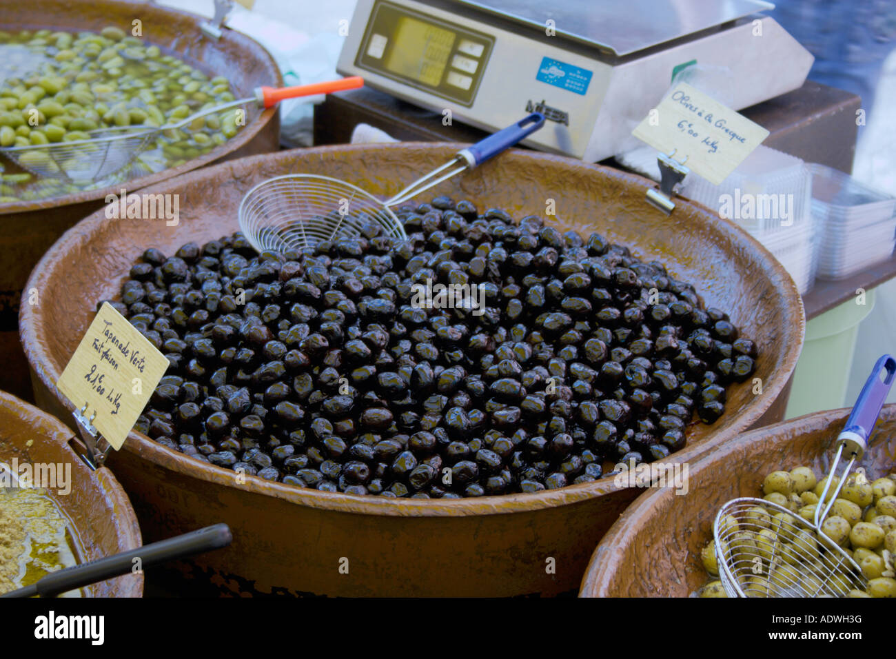 Olives for sale on a typical French market in the Herault, Languedoc ...