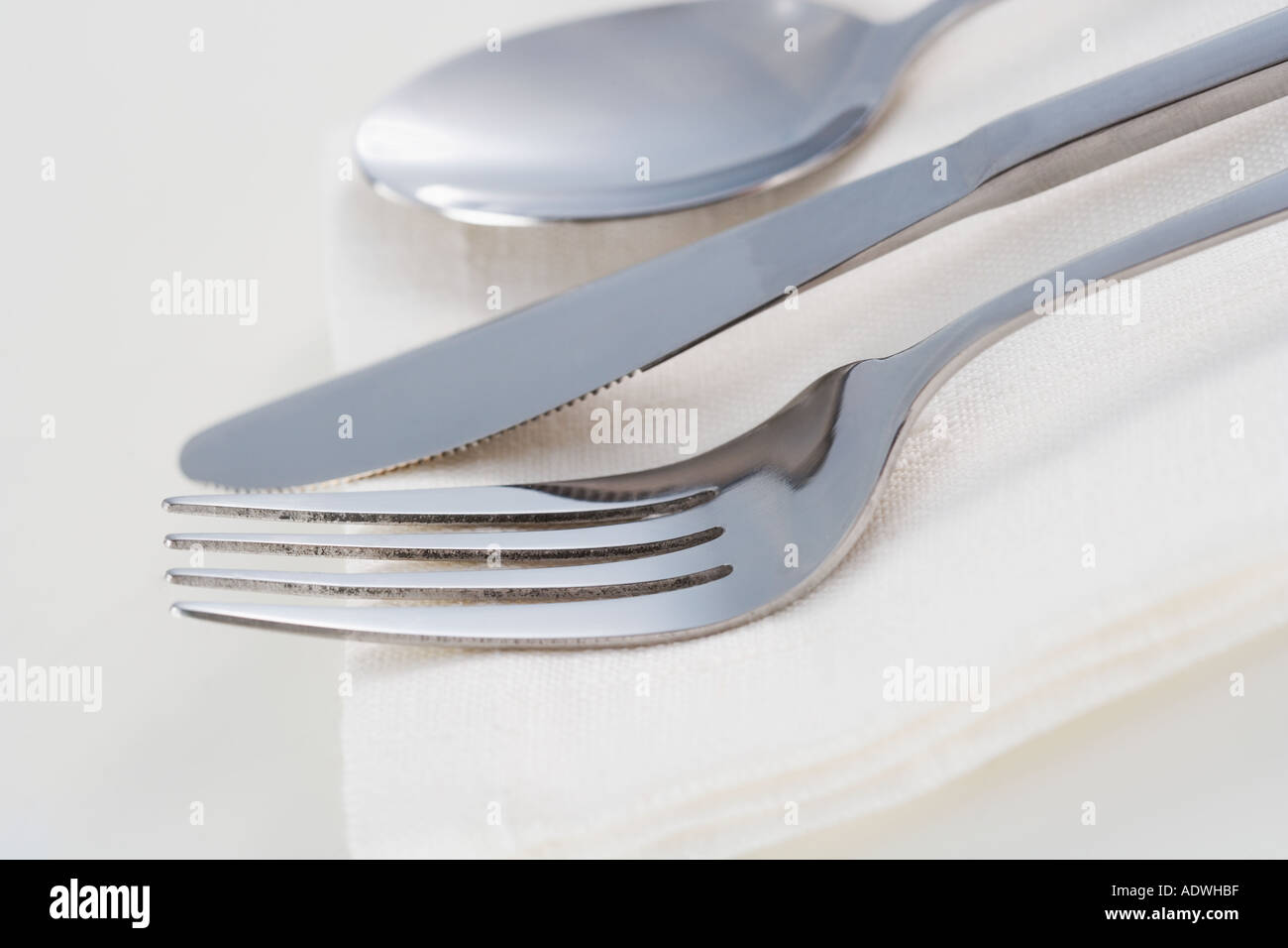 Still life of silverware and napkin Stock Photo - Alamy