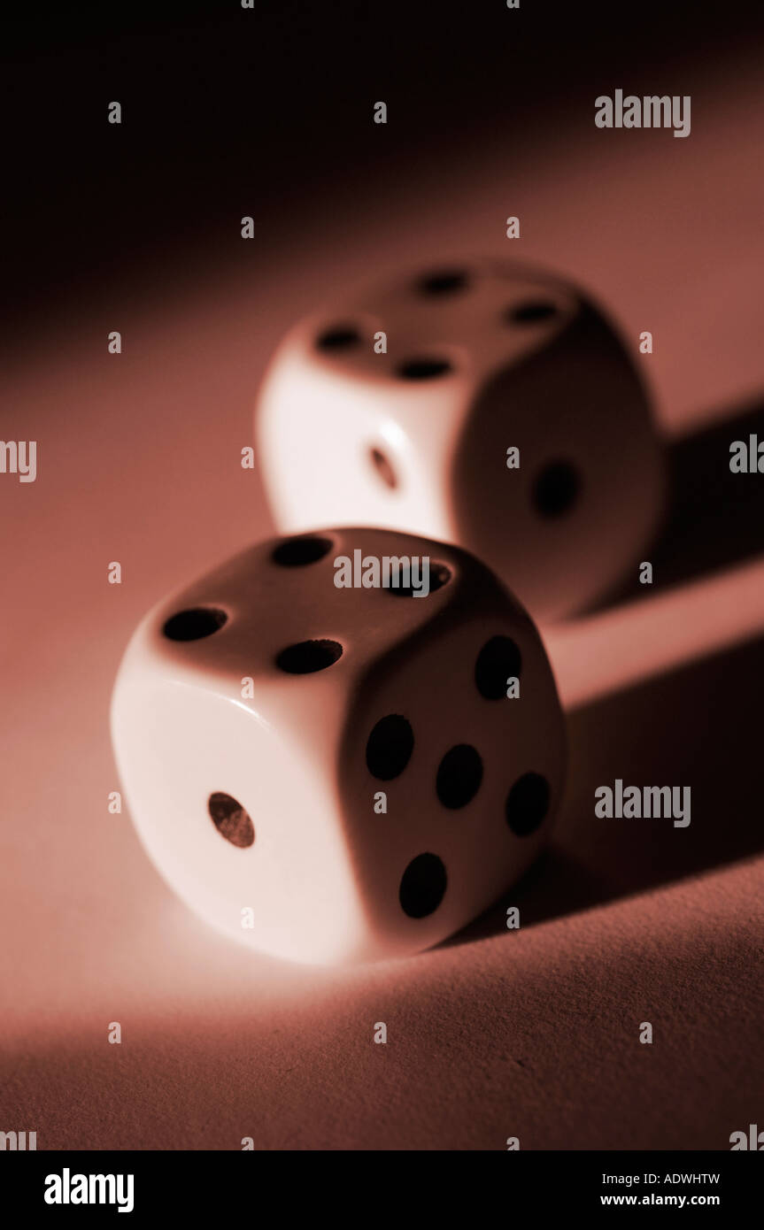 Pair of dice showing 2 fours Stock Photo - Alamy