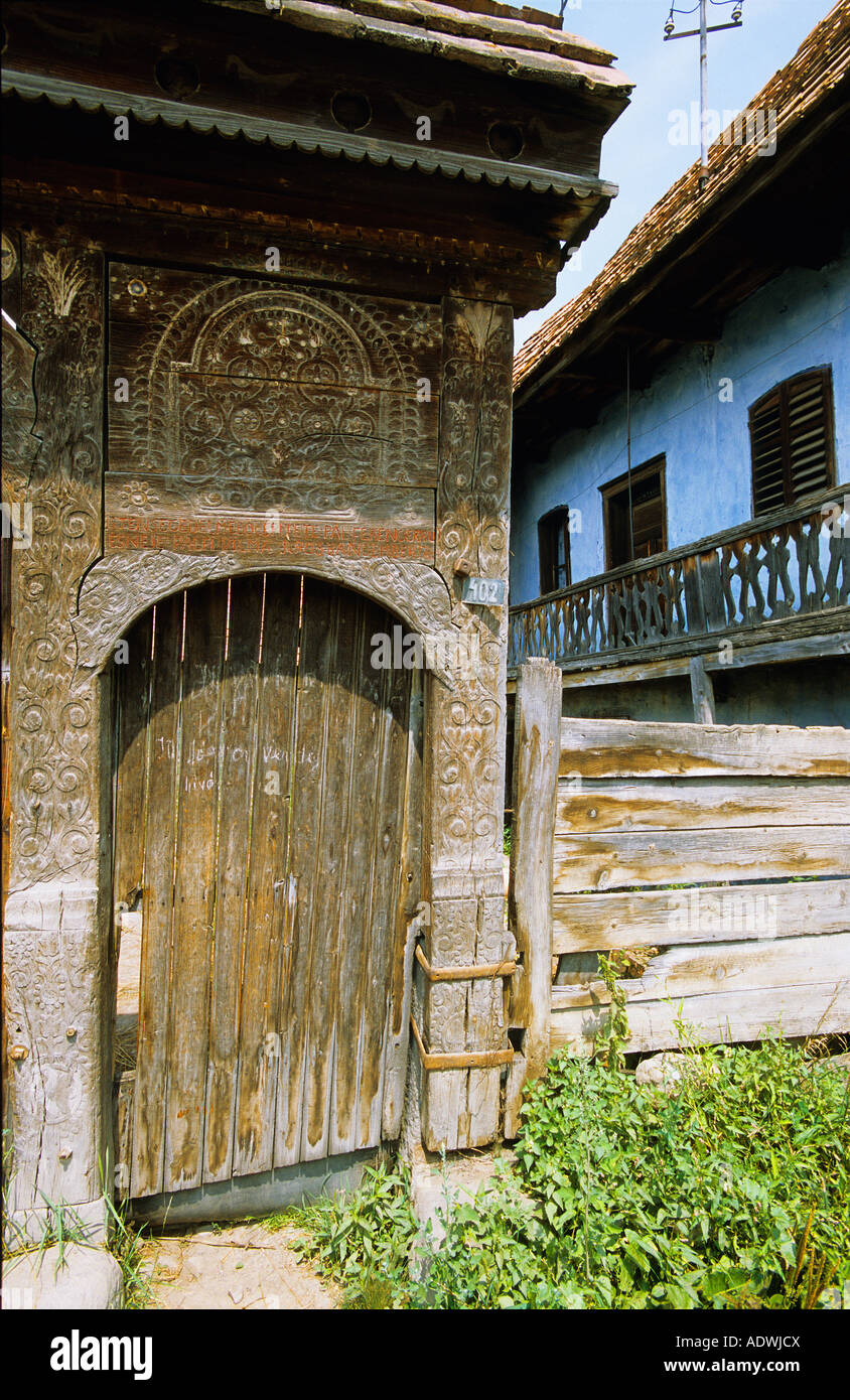 Ornamental carved wood Szekely village farm gate Transylvania Romania ...