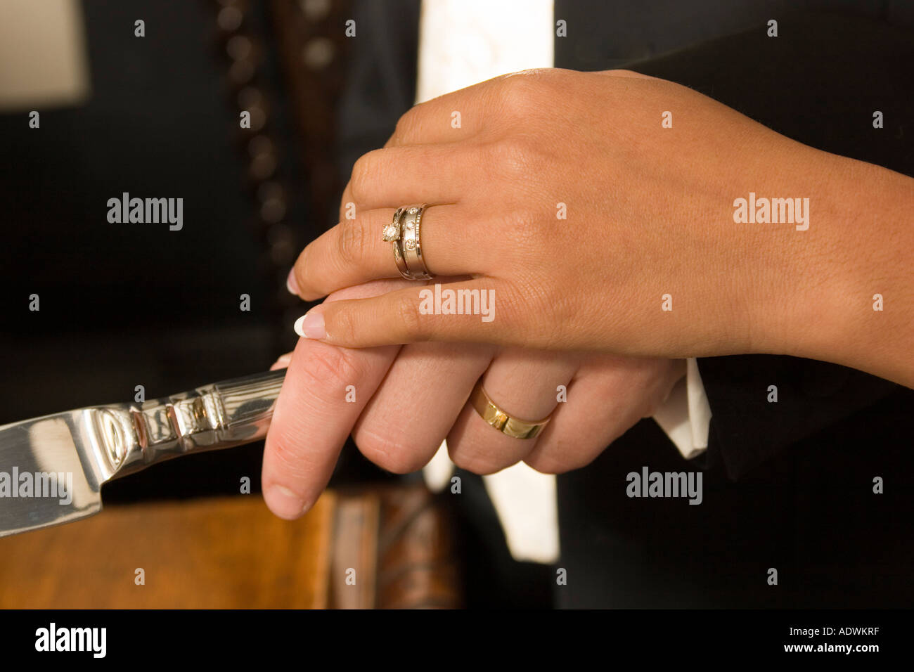 weddings hands of bride and groom in mixed race marriage Stock Photo ...