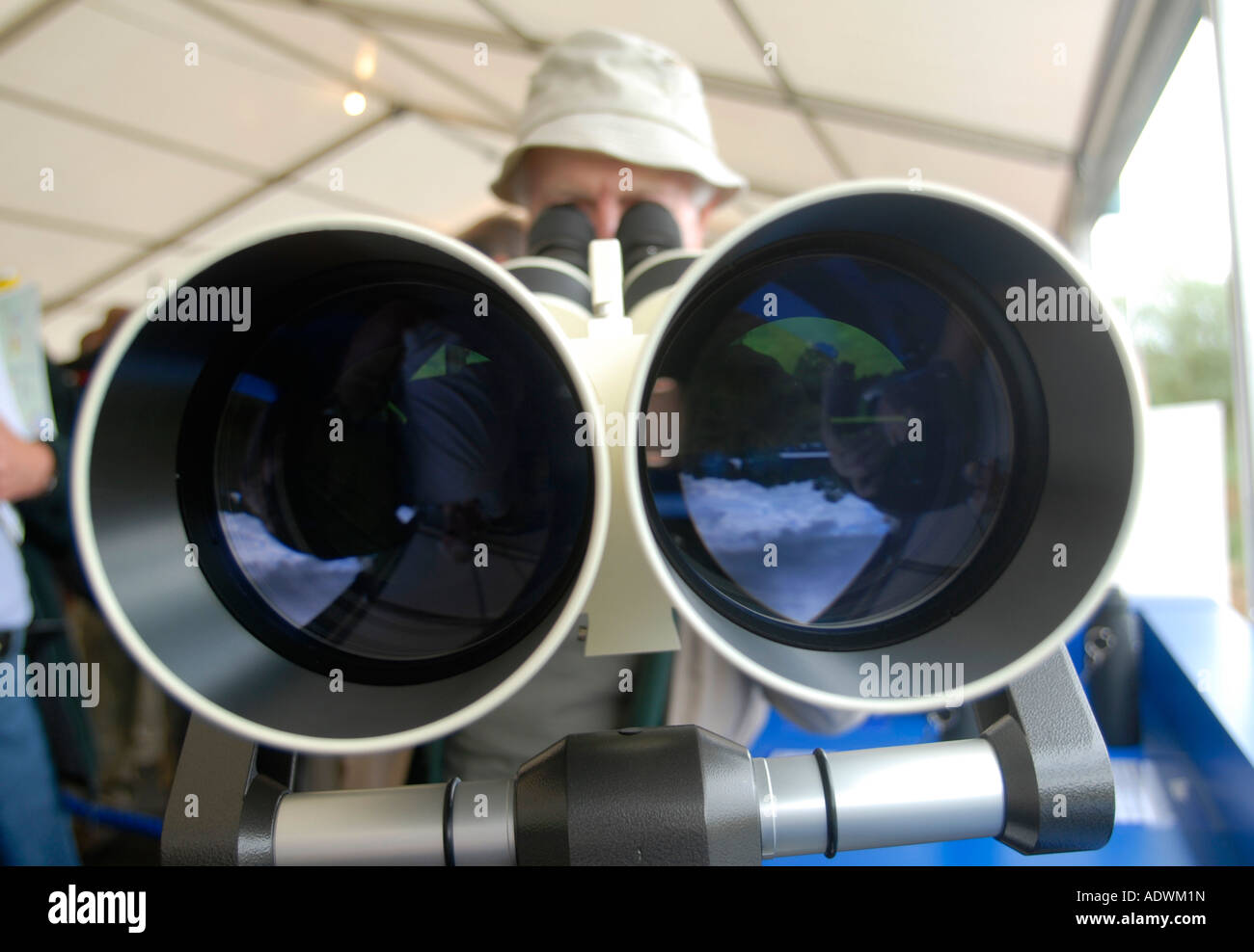 A birdwatcher using 3 000 20x125 binoculars at the 2007 British ...