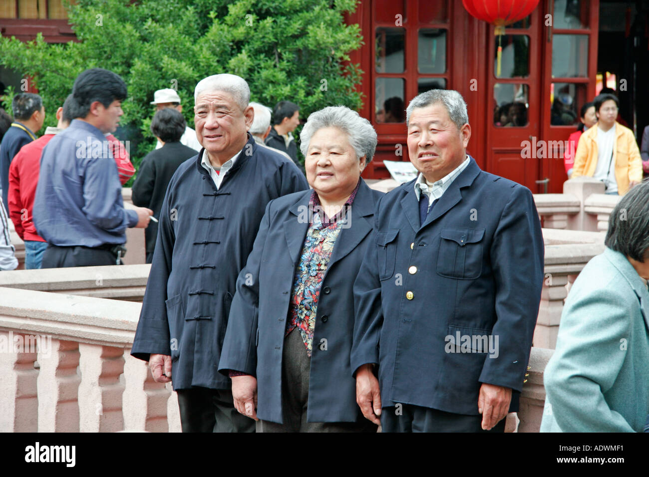 Three elderly Chinese citizens pose for a picture at the Old City in ...