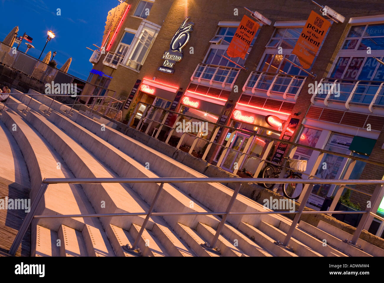 Wales Cardiff Cardiff Bay Mermaid Quay at night Stock Photo - Alamy