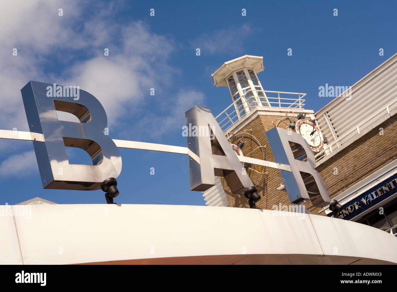 Wales Cardiff Cardiff Bay nightlife seafront Bar sign and Willows Clock ...