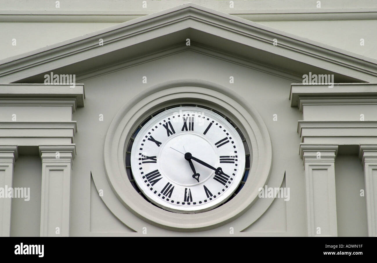 A clock on St Louis Cathedral showing twenty past five Stock Photo - Alamy
