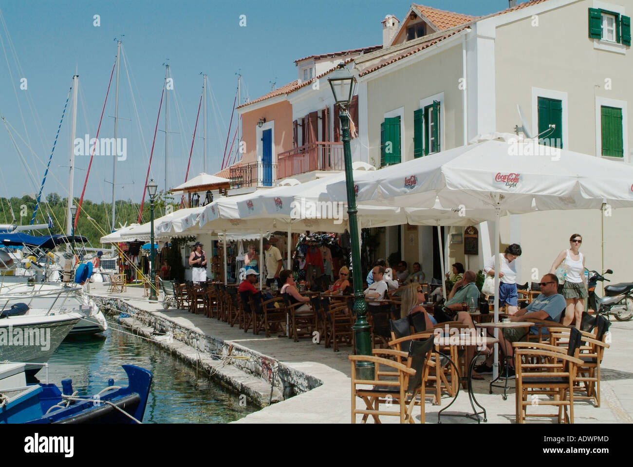 Harbour with boats and restaurants in Fiskardo in Kefalonia in Greece ...
