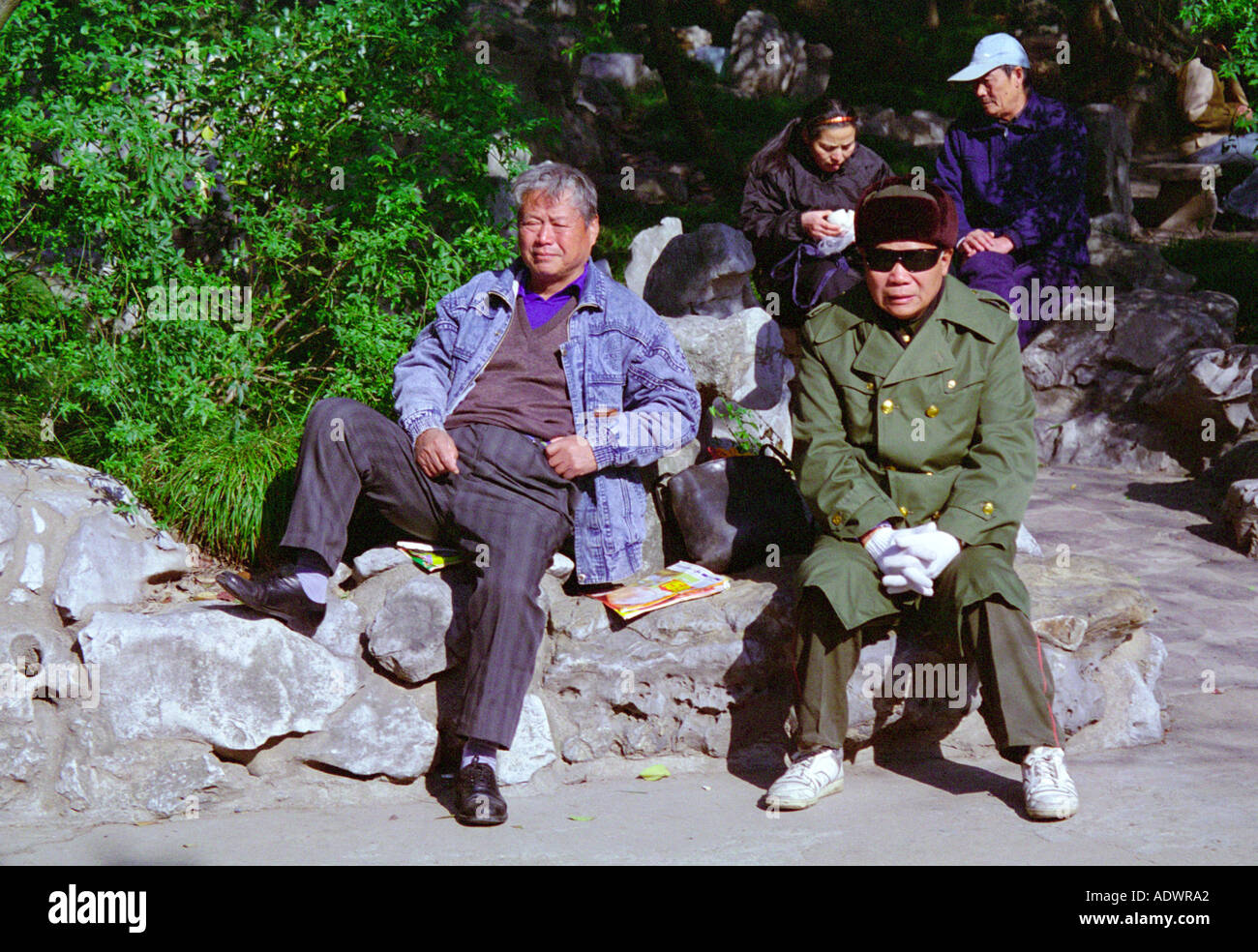 Old men sitting in a park china hi-res stock photography and images - Alamy