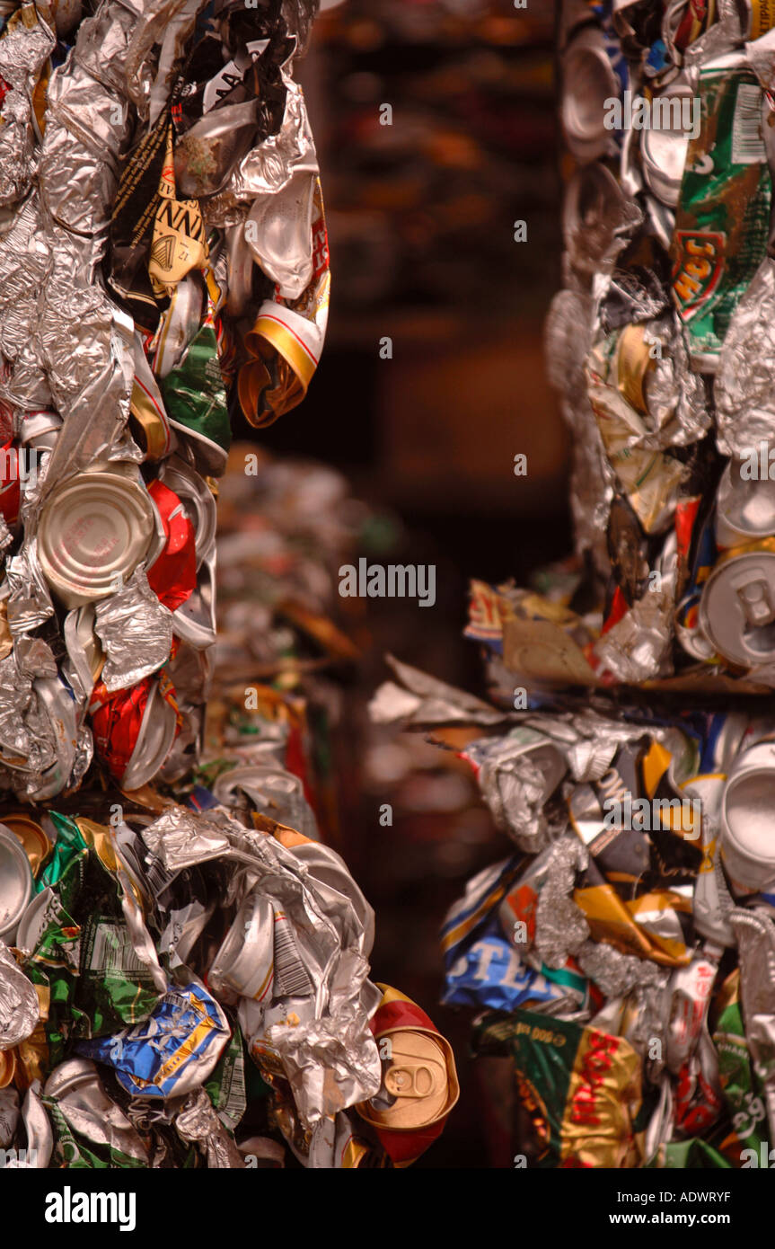 CRUSHED TIN CANS IN BALES AT A METAL RECYCLING FACILITY ON THE DOCKSIDE ...