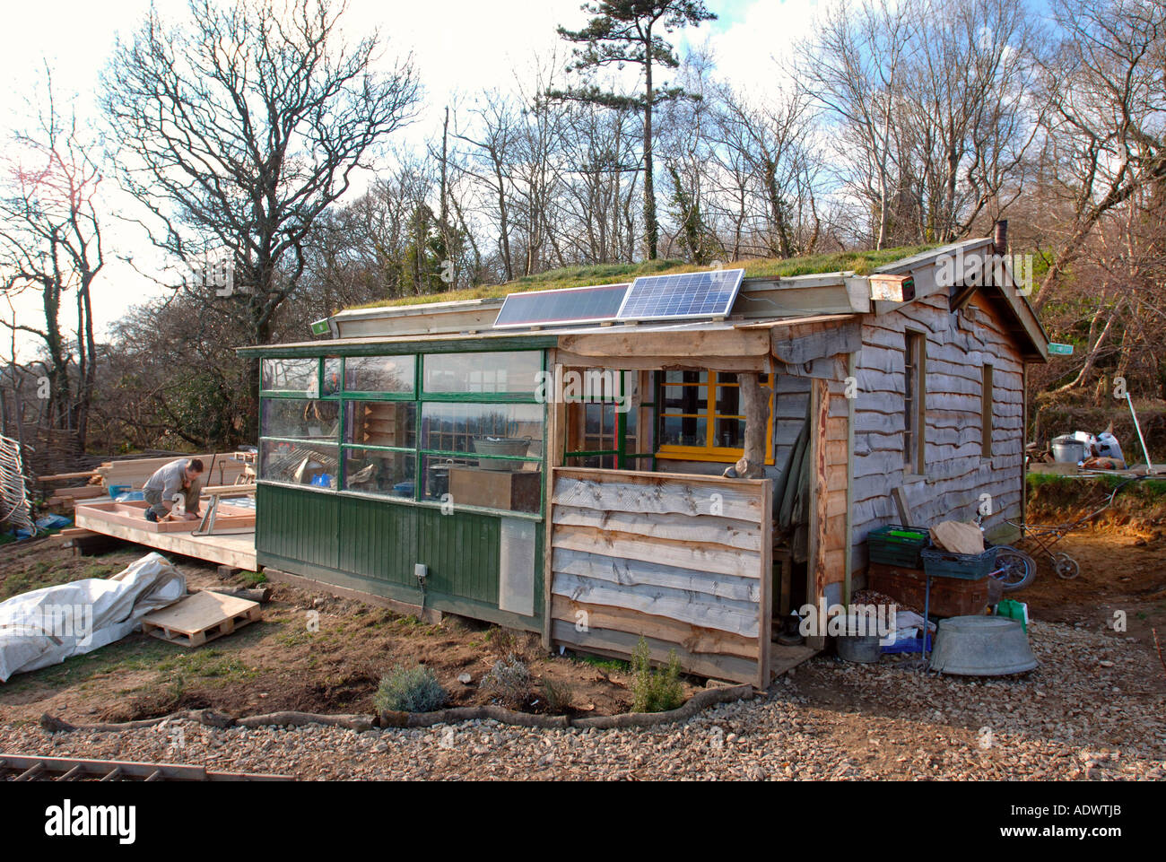 AN ECO FRIENDLY HOUSE WITH A SOLAR PANEL AND TURF ROOF DORSET UK Stock ...