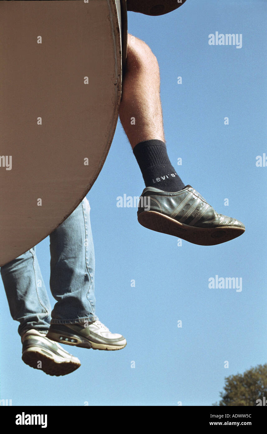view of three feet from below watching concert Stock Photo - Alamy