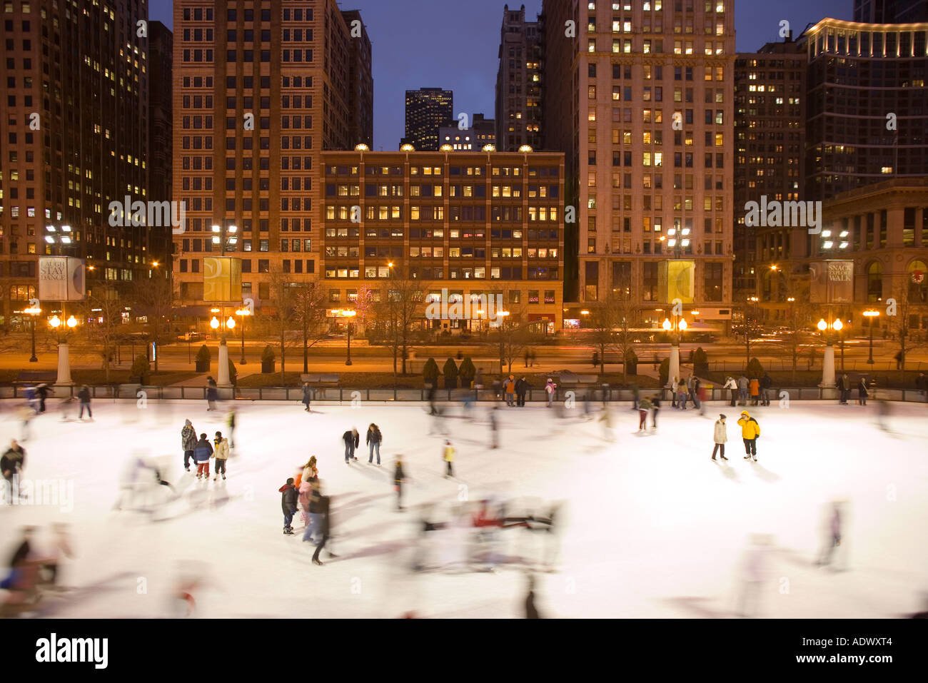 skaters in ice rink in Millennium Park Chicago Illinois Stock Photo - Alamy