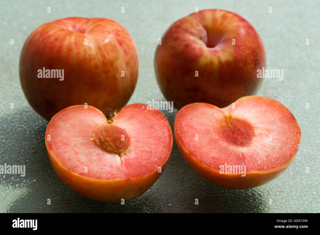 Plums displayed for sale Stock Photo - Alamy
