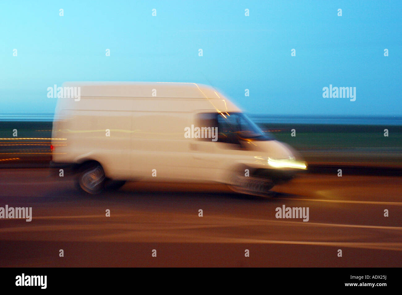 Van moving fast Stock Photo - Alamy