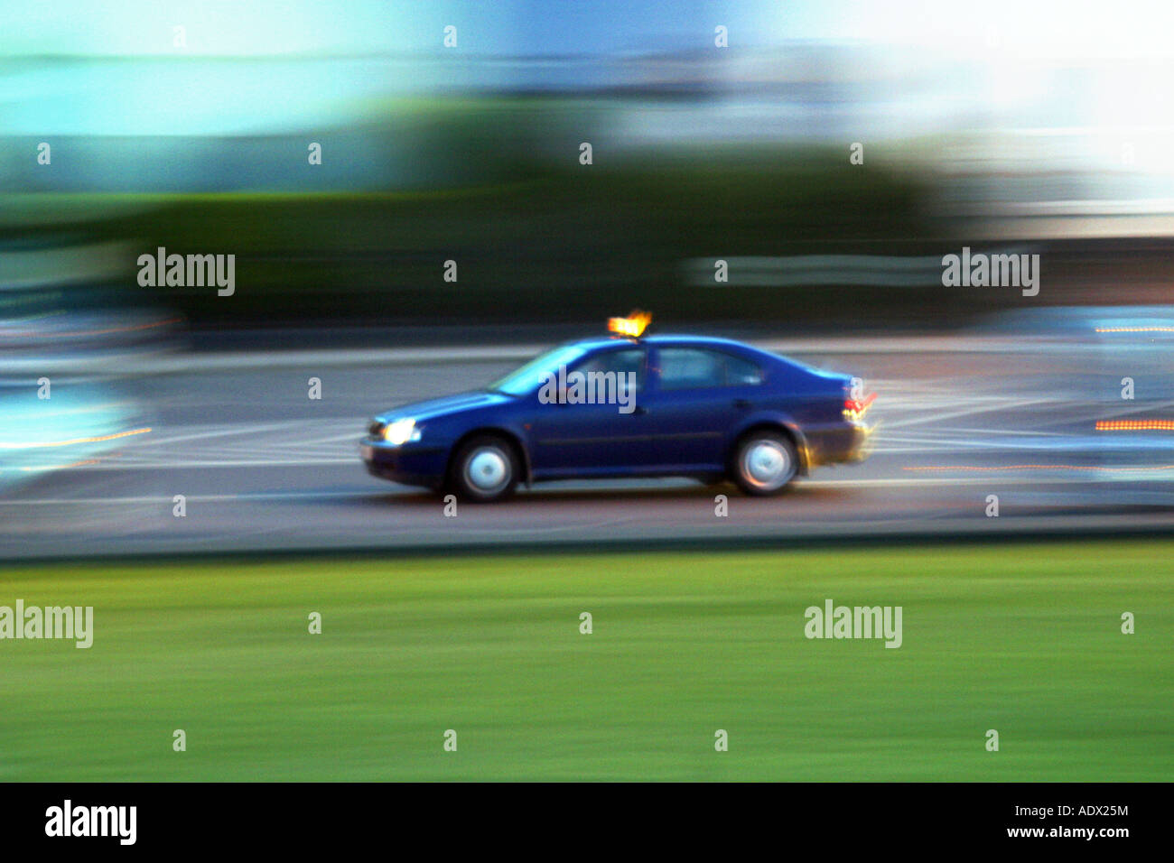Car moving fast Stock Photo - Alamy