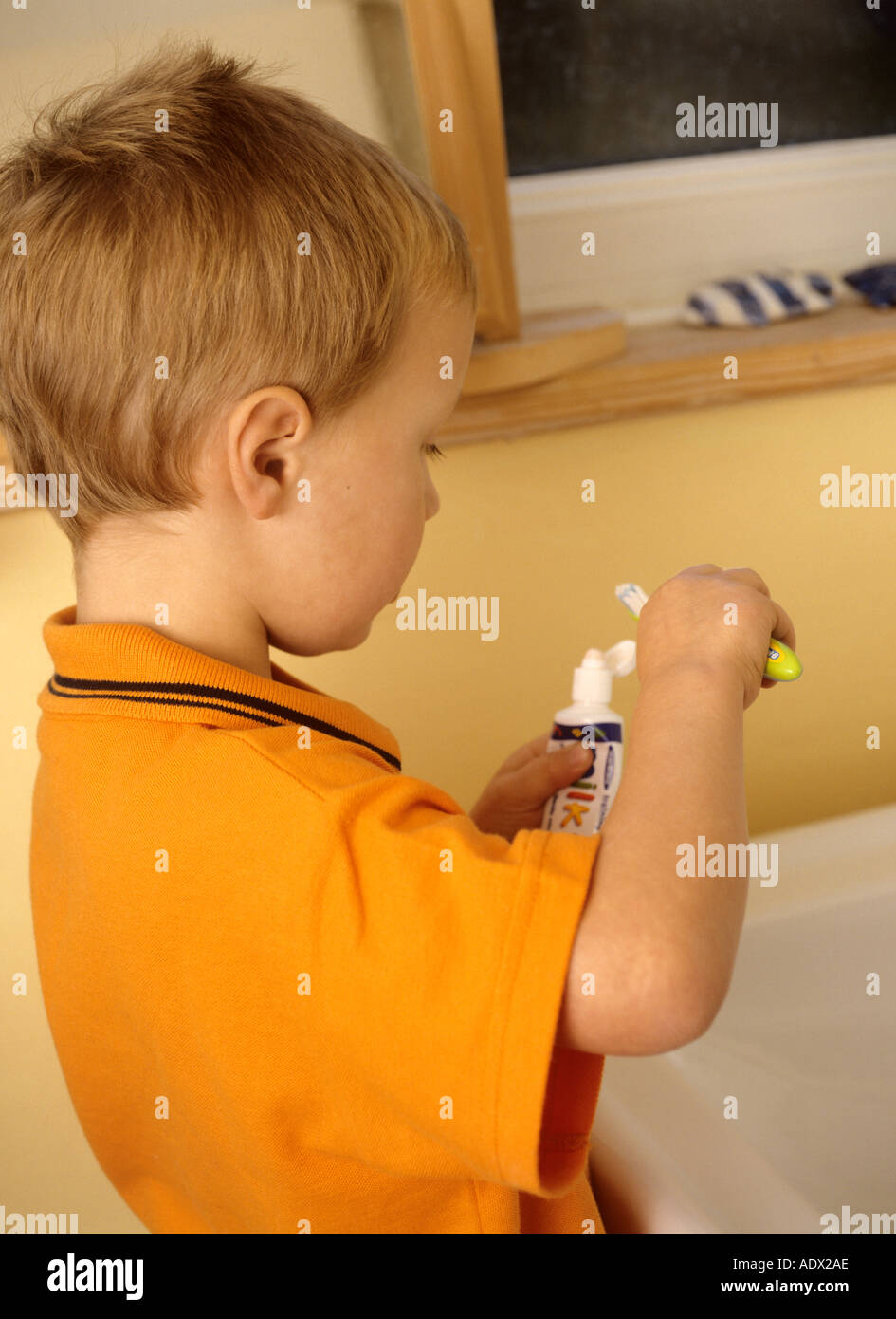 Young boy brushing his teeth with toothpaste, oral hygiene, U.K. UK ...