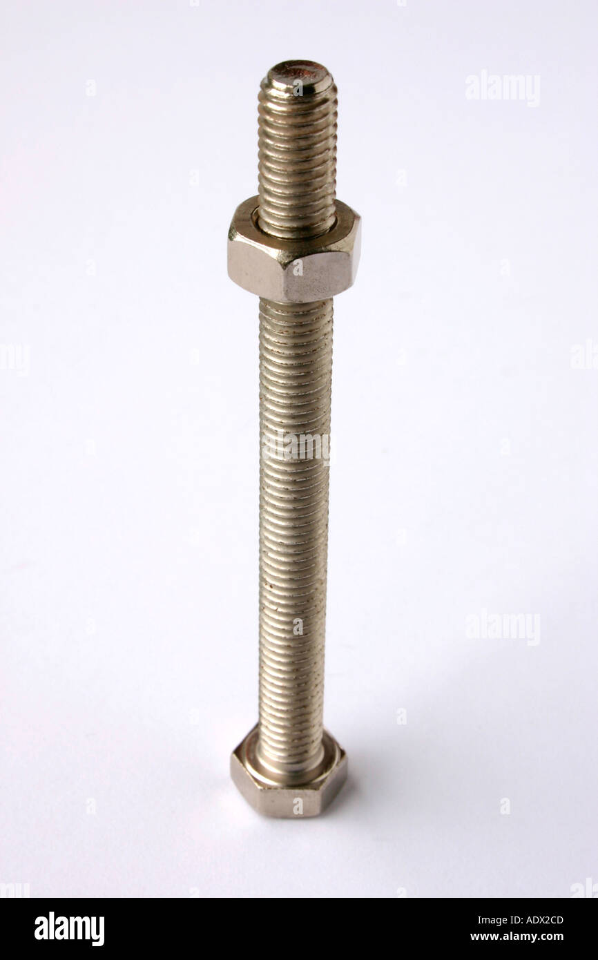 A single upright bolt with a nut screwed onto it on a plain white ...