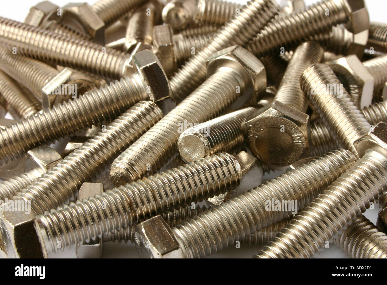 A pile of shiny silver bolts Stock Photo - Alamy