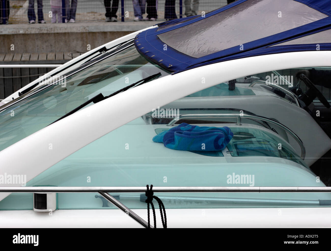 Detail of power boat passing through marina lock Stock Photo - Alamy