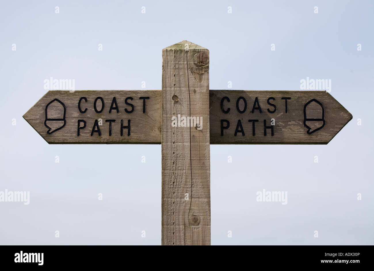 A timber coastal path sign Taken on the Devon coast UK Stock Photo - Alamy