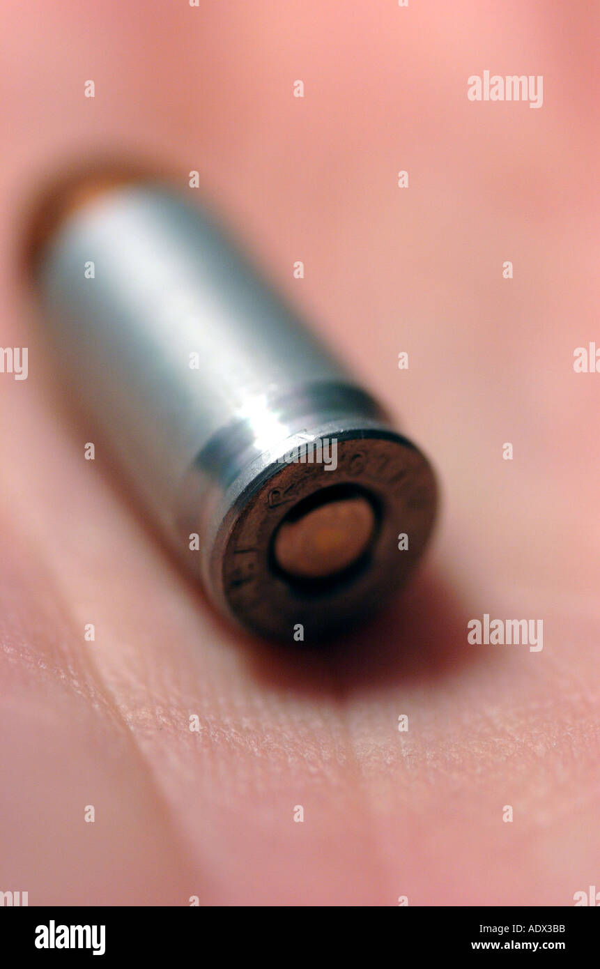 Bullet in palm hi-res stock photography and images - Alamy