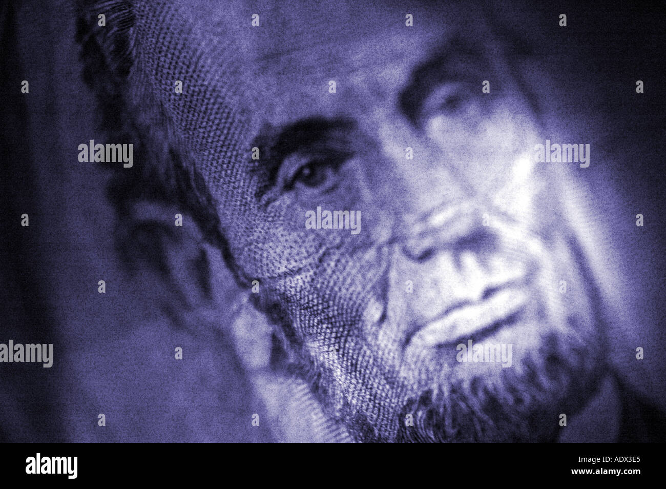 Close up of Abraham Lincoln s face on the rear back of a five 5 dollar ...