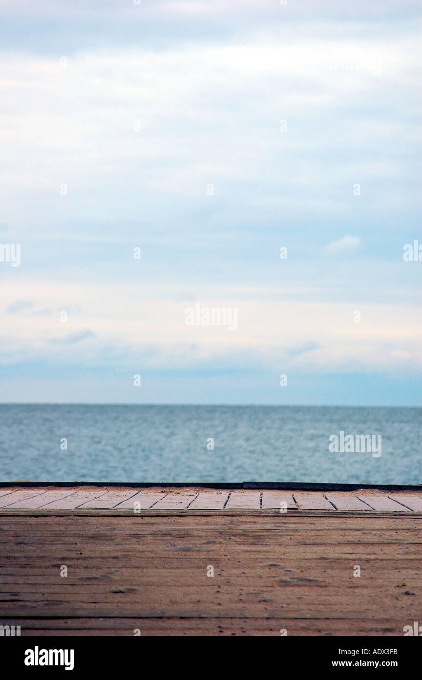 simple sand boardwalk water and sky vertical simple beach concept Stock ...