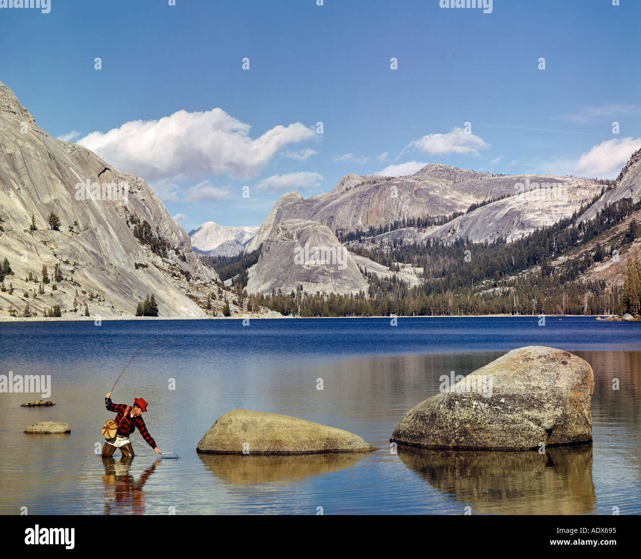 man fishing Tenaya Lake Yosemite National Park California USA Stock ...