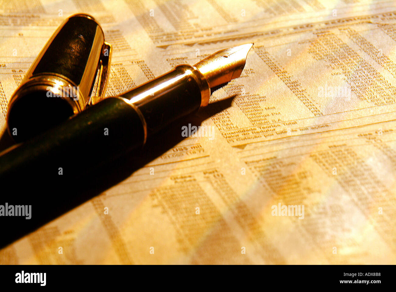 Business Concepts pen fountain open cap ink newspaper pages stock ...