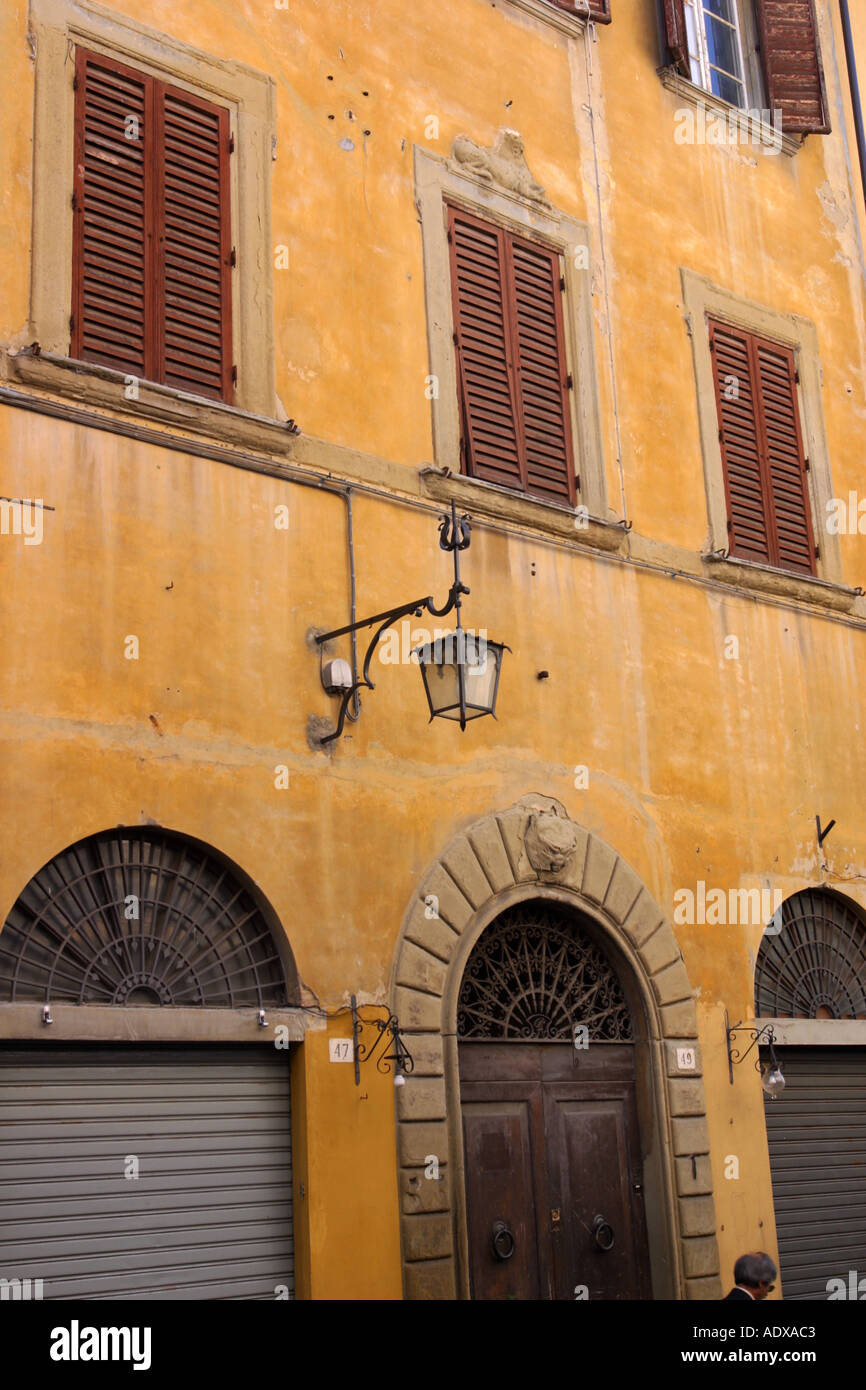 Typical window shutters and street lamp Arezzo Italy Stock Photo - Alamy