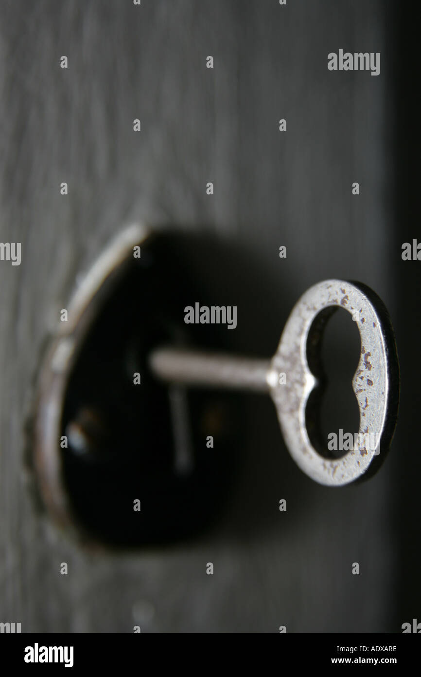 Key in Lock Stock Photo - Alamy